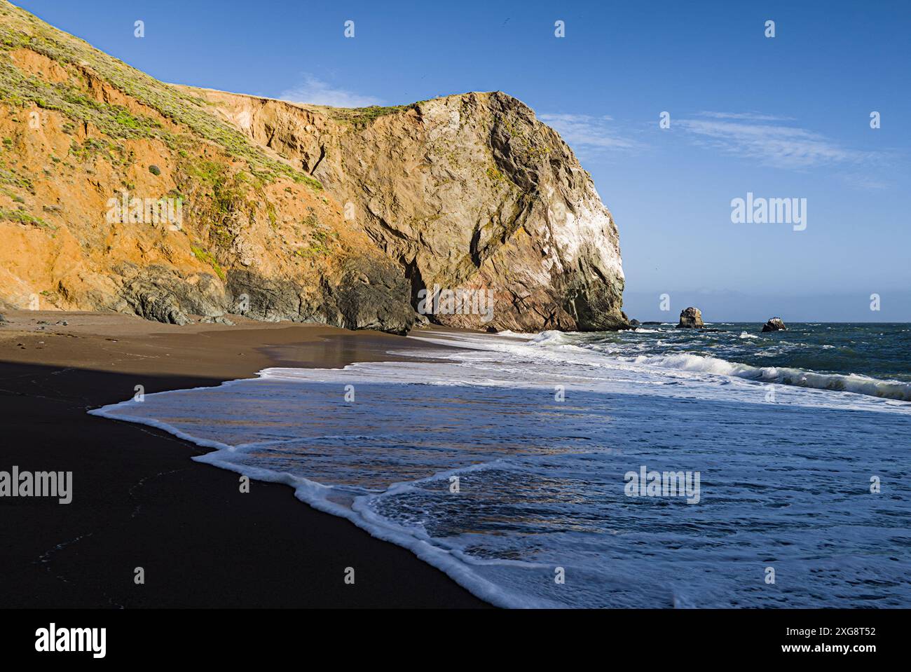 California beach with cliffs, waves and reflections Stock Photo - Alamy