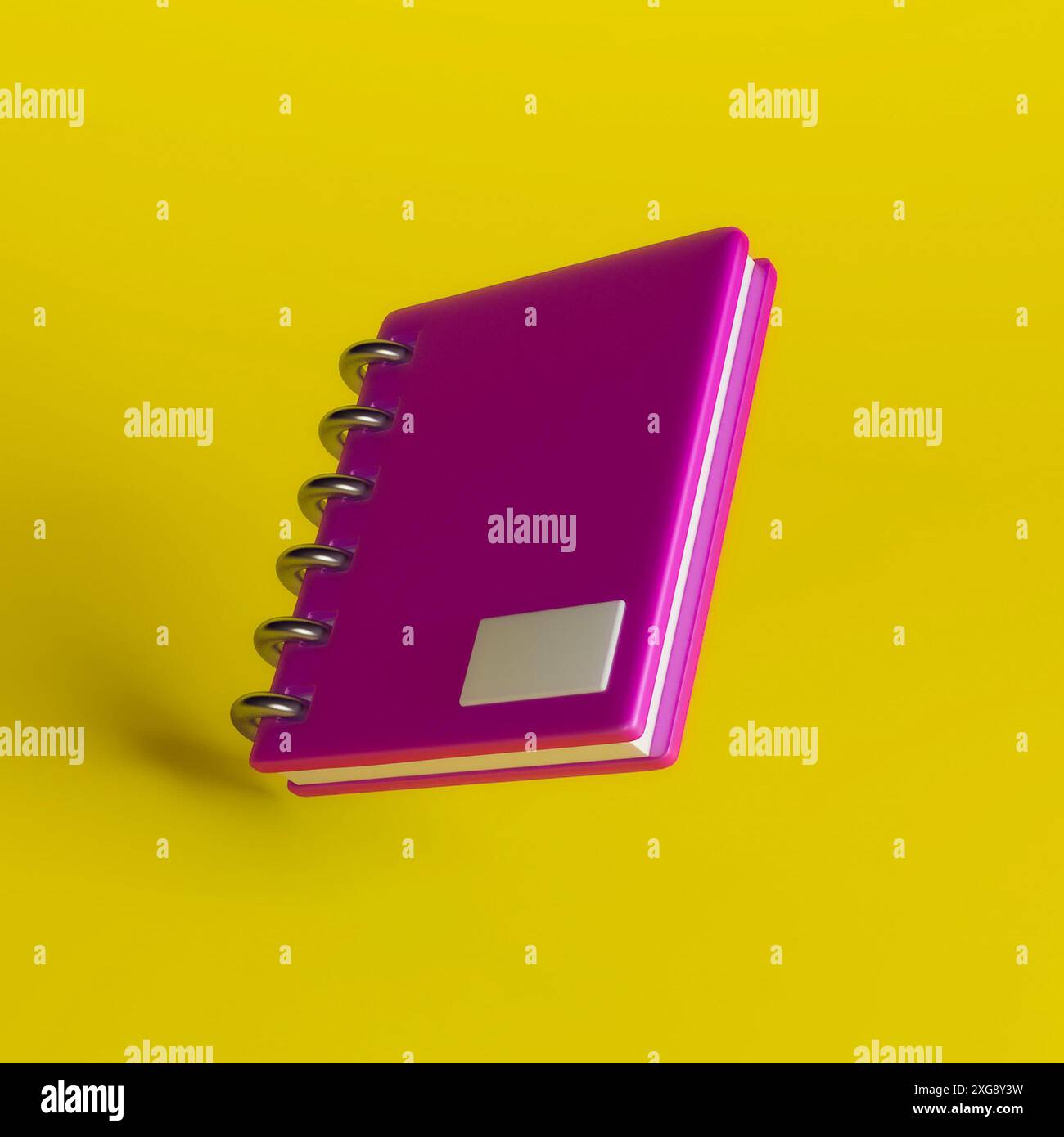 3D render of a pink spiral notebook with a metallic label on the cover ...