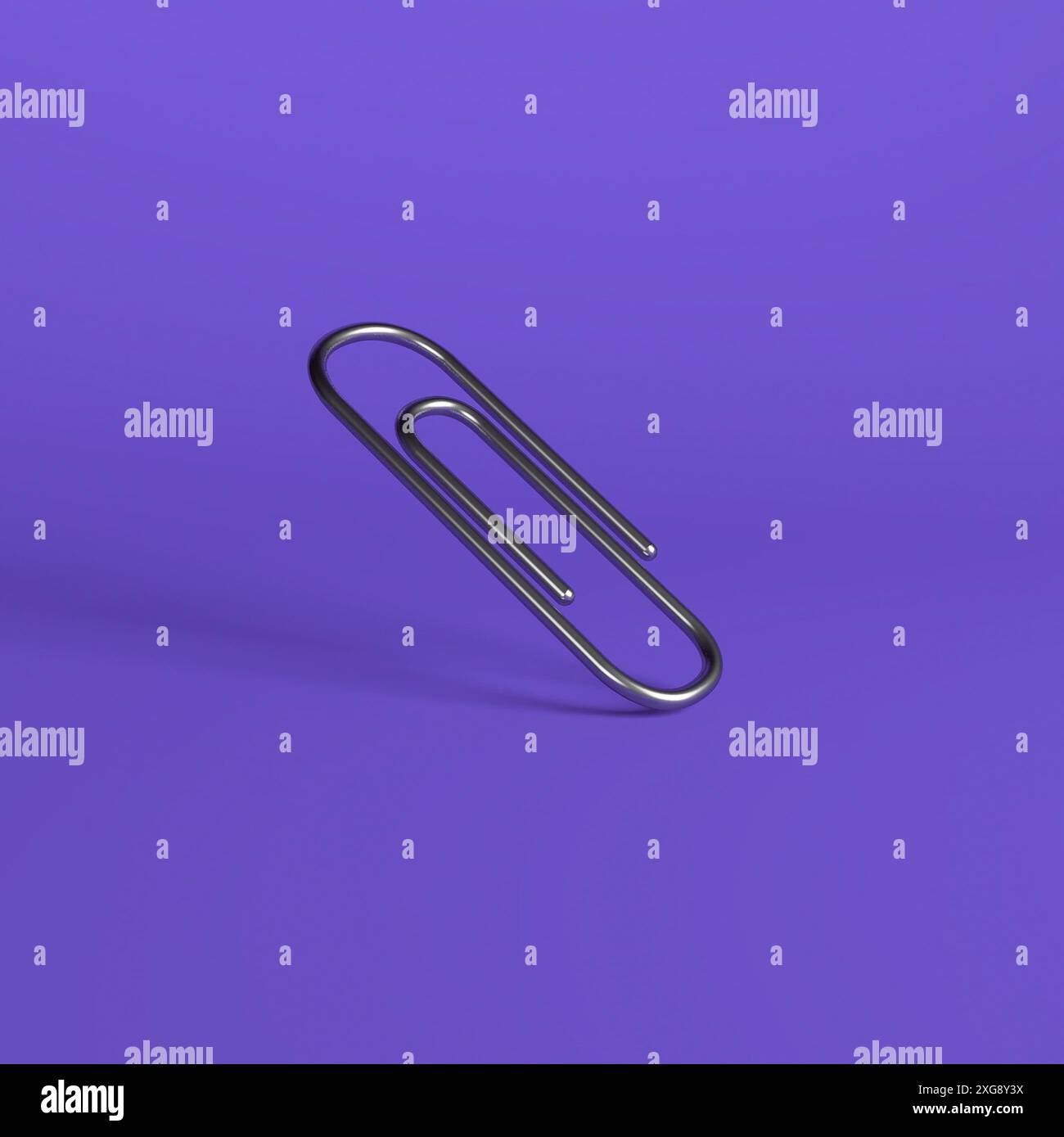 3D illustration of a silver paper clip floating against a purple ...