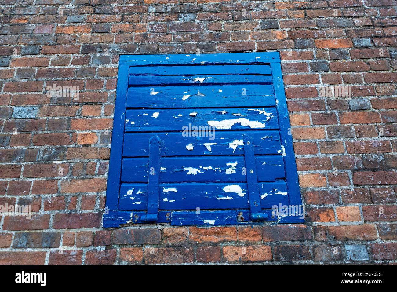 Crackled trap door - blue texture Stock Photo - Alamy