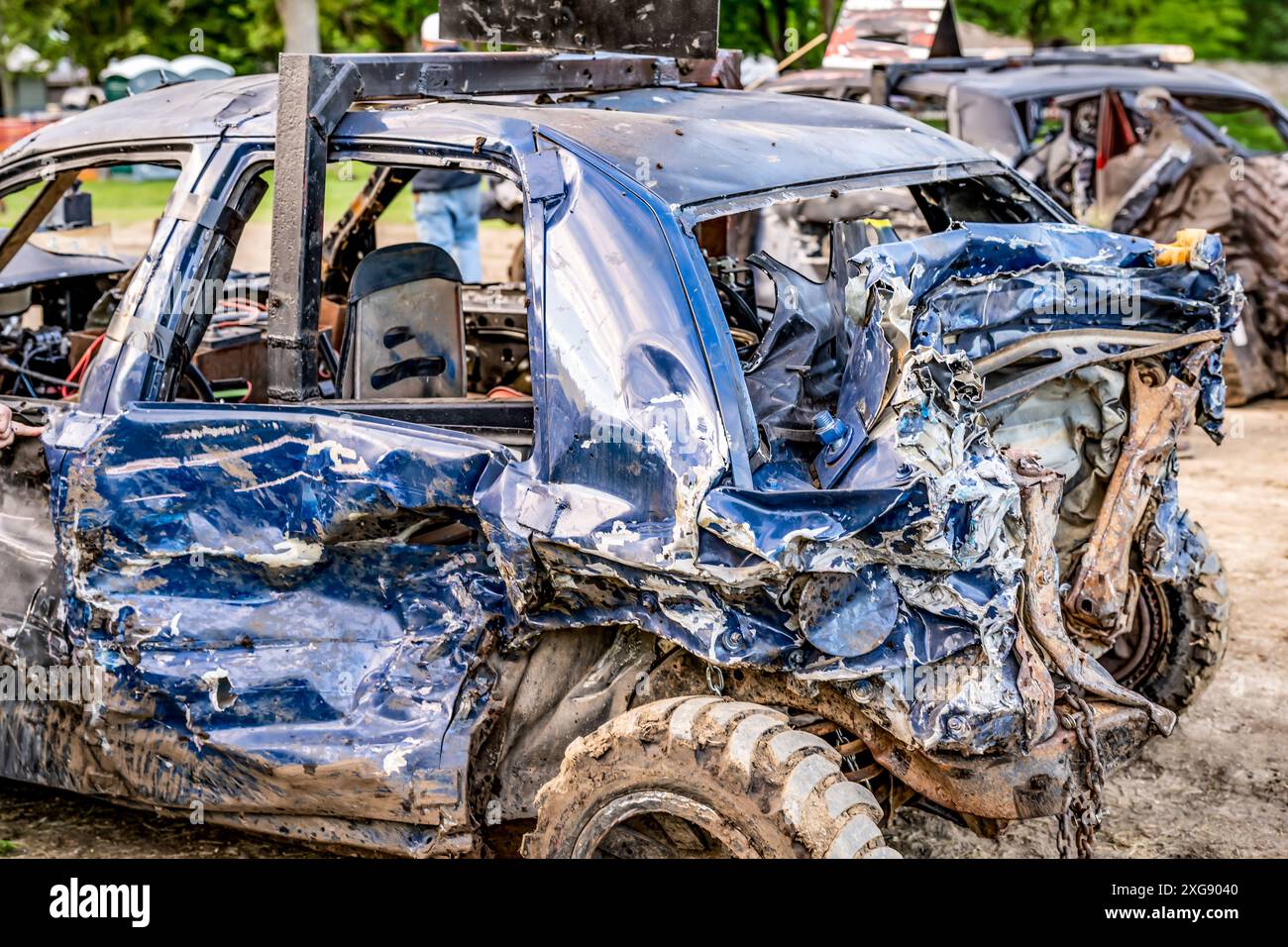 Dented and damaged rear end of a modified car used for a demolition ...