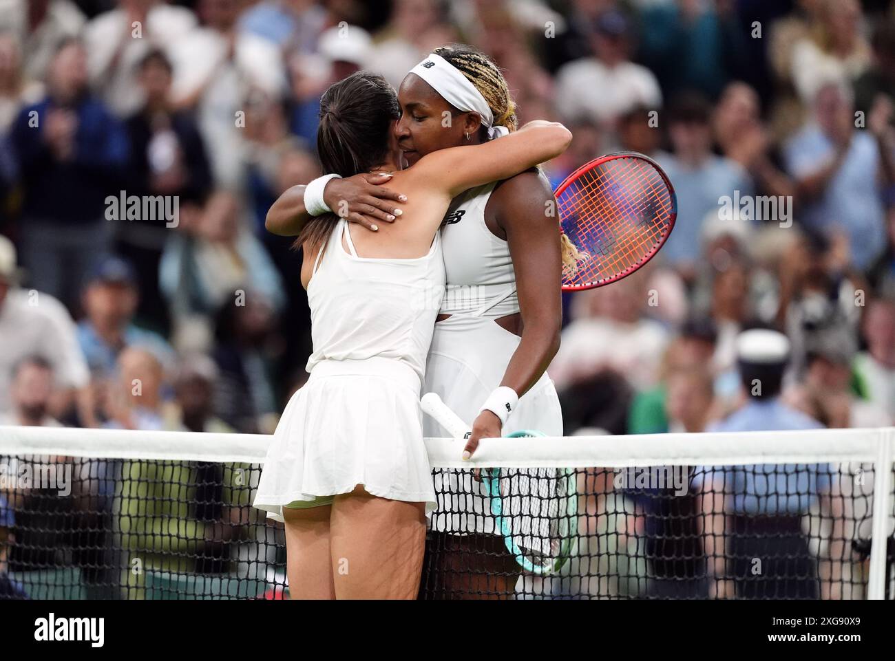 Emma Navarro and Coco Gauff (right) after their match on day seven of ...