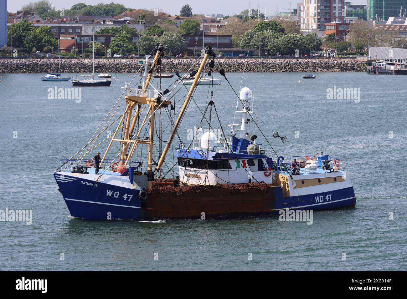 The fishing vessel trawler SATURNUS (WD47) leaves the Camber Docks and ...