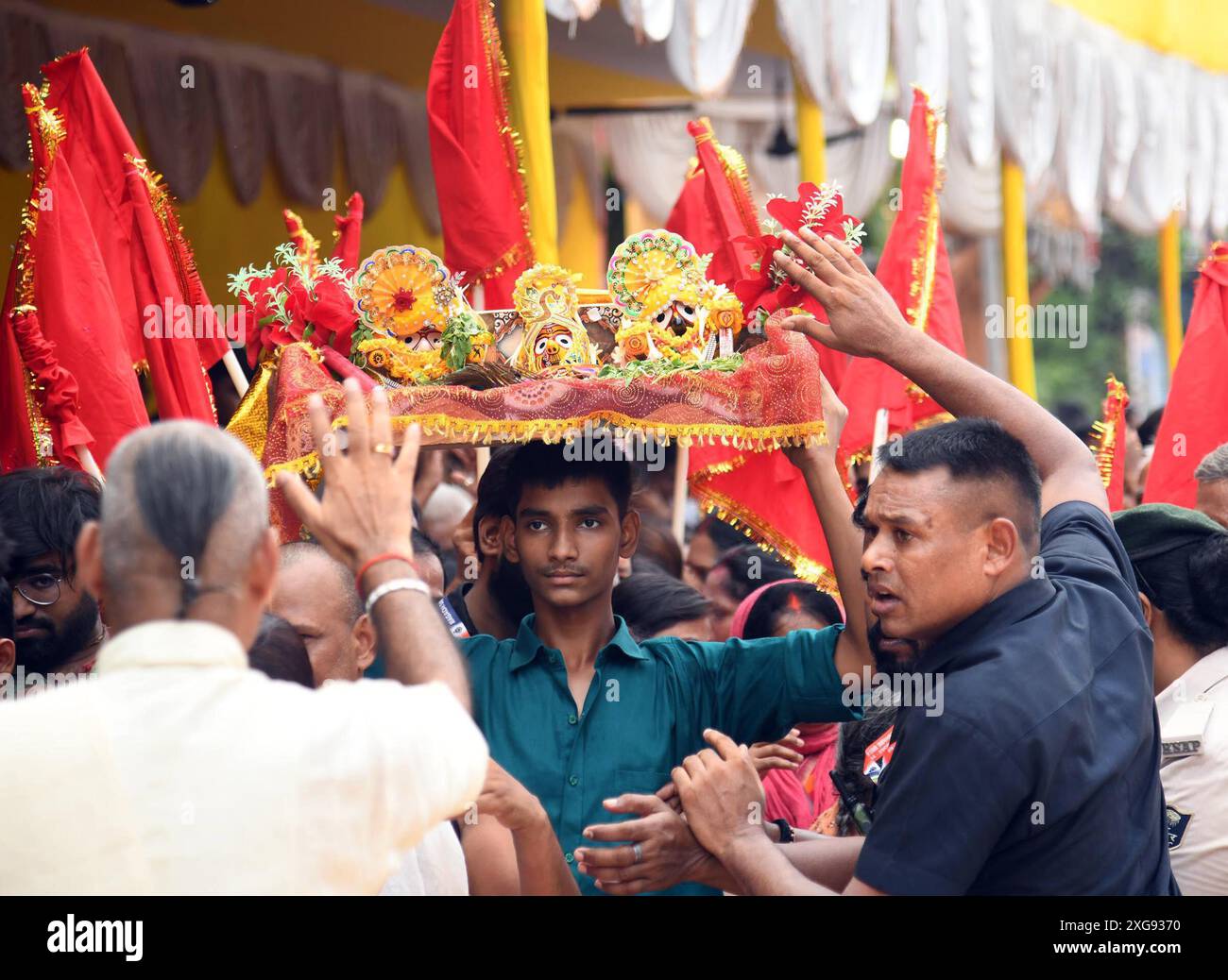 PATNA, INDIA - JULY 7: Devotees carrying idols of lord Jagannath during ...