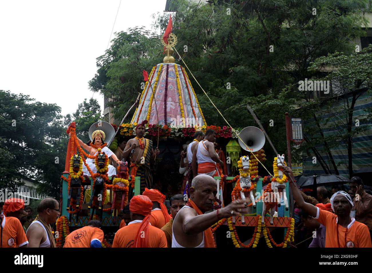 NAVI MUMBAI, INDIA - JULY 7: Devotees seen pulling the chariot, on this ...