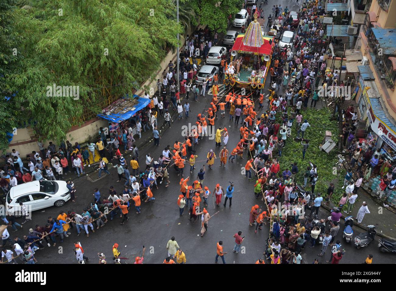 NAVI MUMBAI, INDIA - JULY 7: Devotees seen pulling the chariot, on this ...