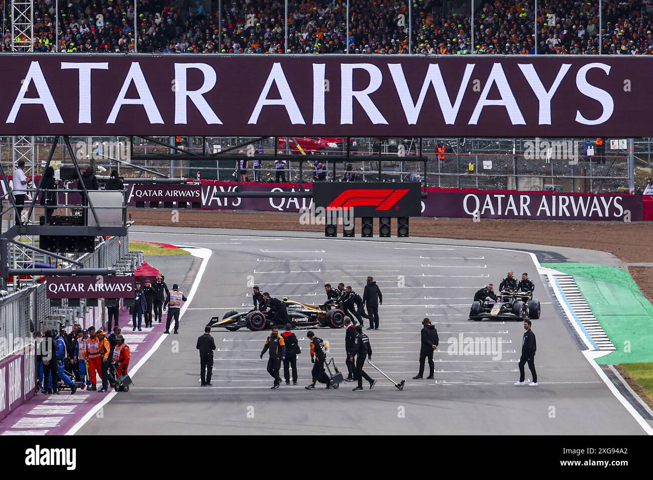 APX GP Team crew filming in the paddock for the Apex F1 movie by Apple ...