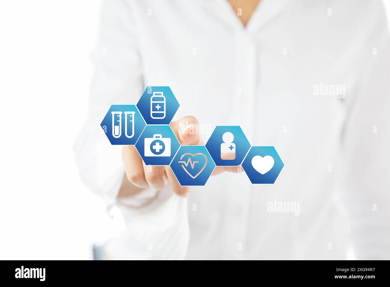 Medical doctor touching icons of healthcare services on digital screen ...