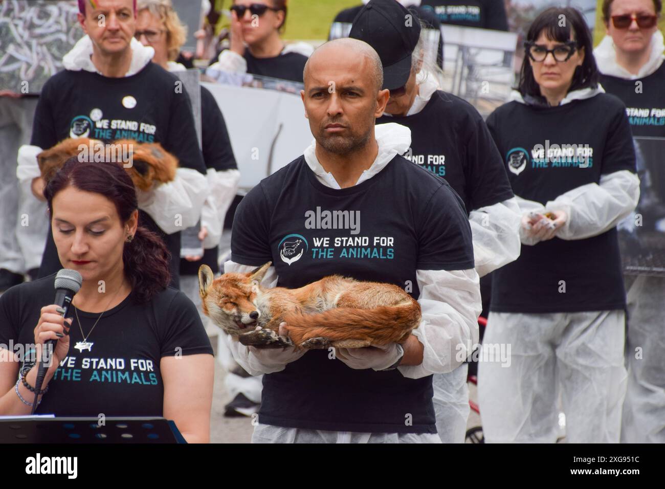 London, UK. 07th July, 2024. An activist holds a dead fox during the We ...