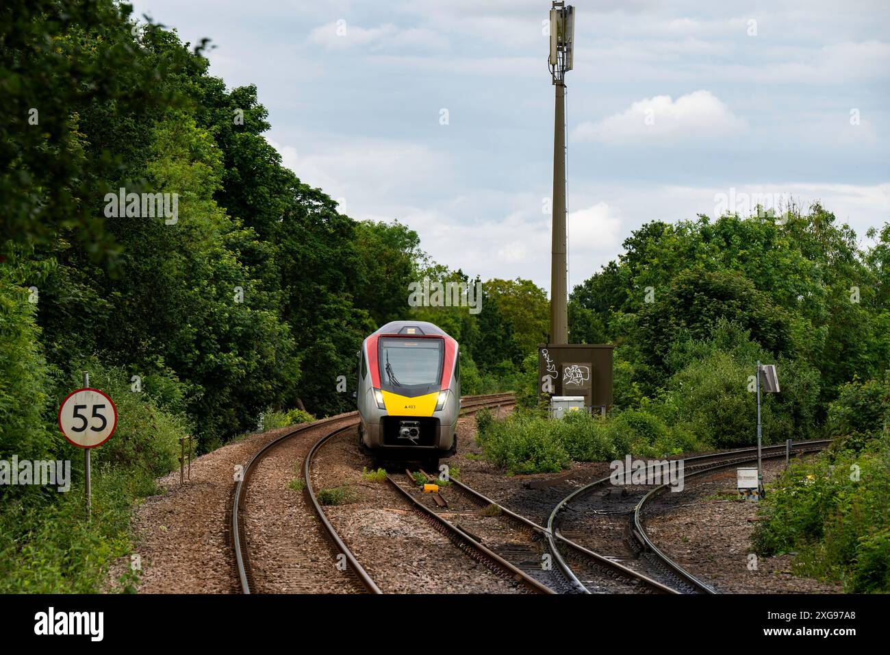 Passenger train approaching the Felixstowe branch line junction on the ...
