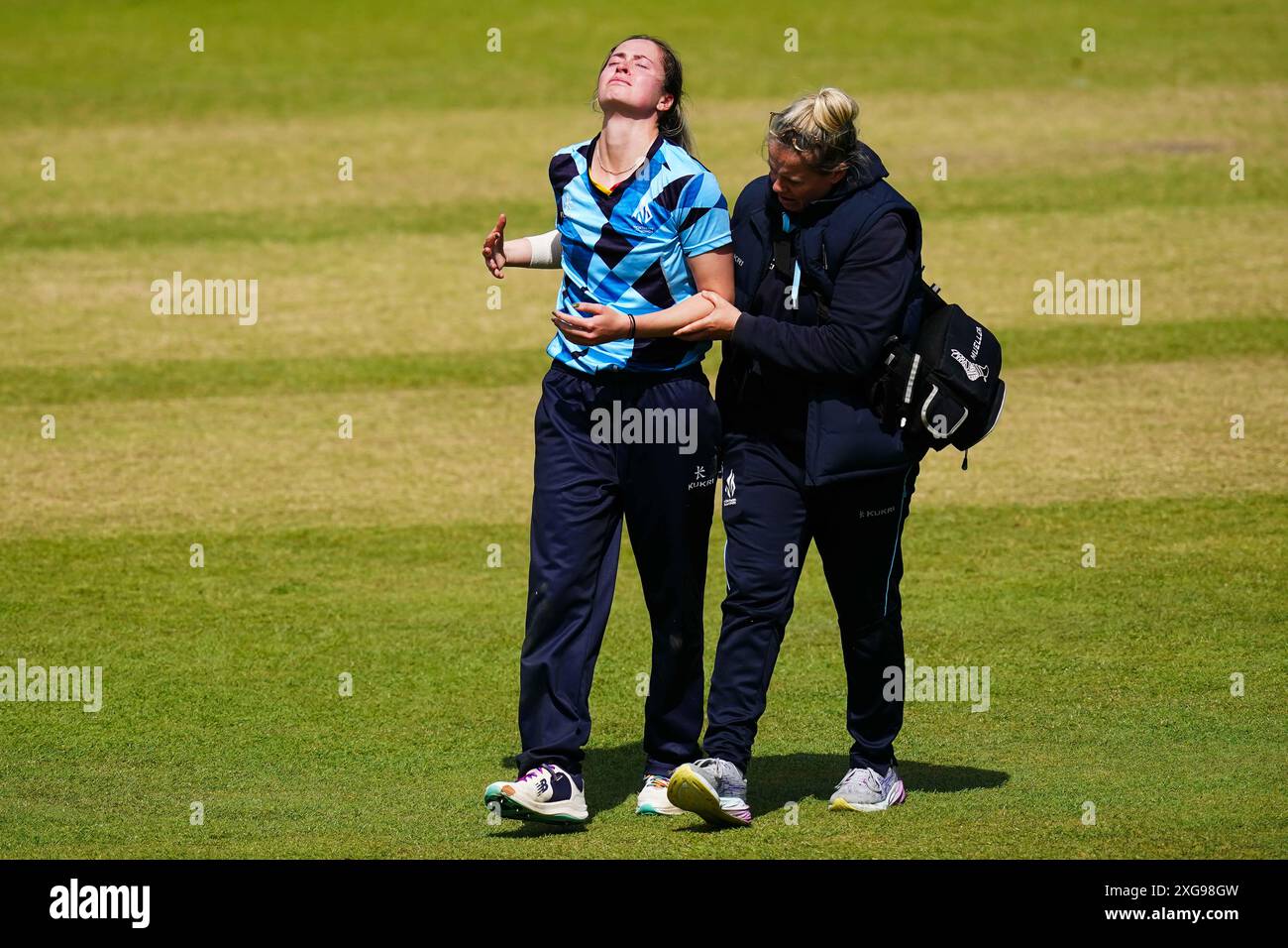 Cheltenham, UK, 7 July 2024. Northern Diamonds' Rachel Slater is helped ...