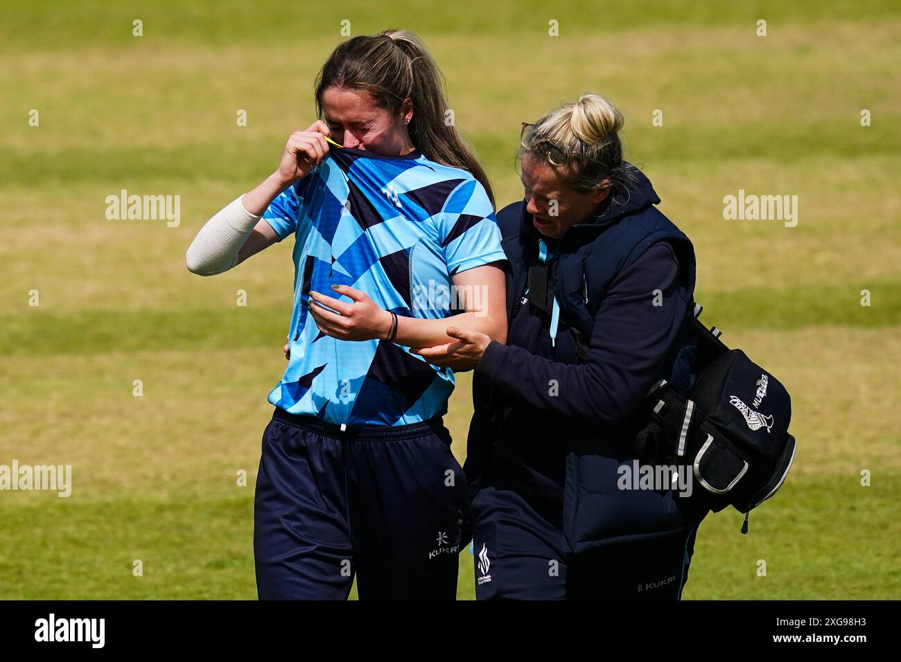 Cheltenham, UK, 7 July 2024. Northern Diamonds' Rachel Slater is helped ...
