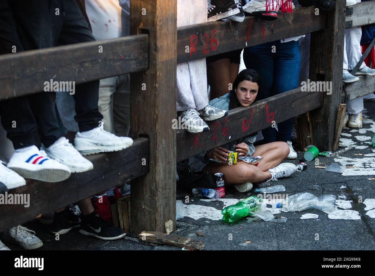 Pamplona, Navarra, Spain. 7th July, 2024. A spectator positioned along ...