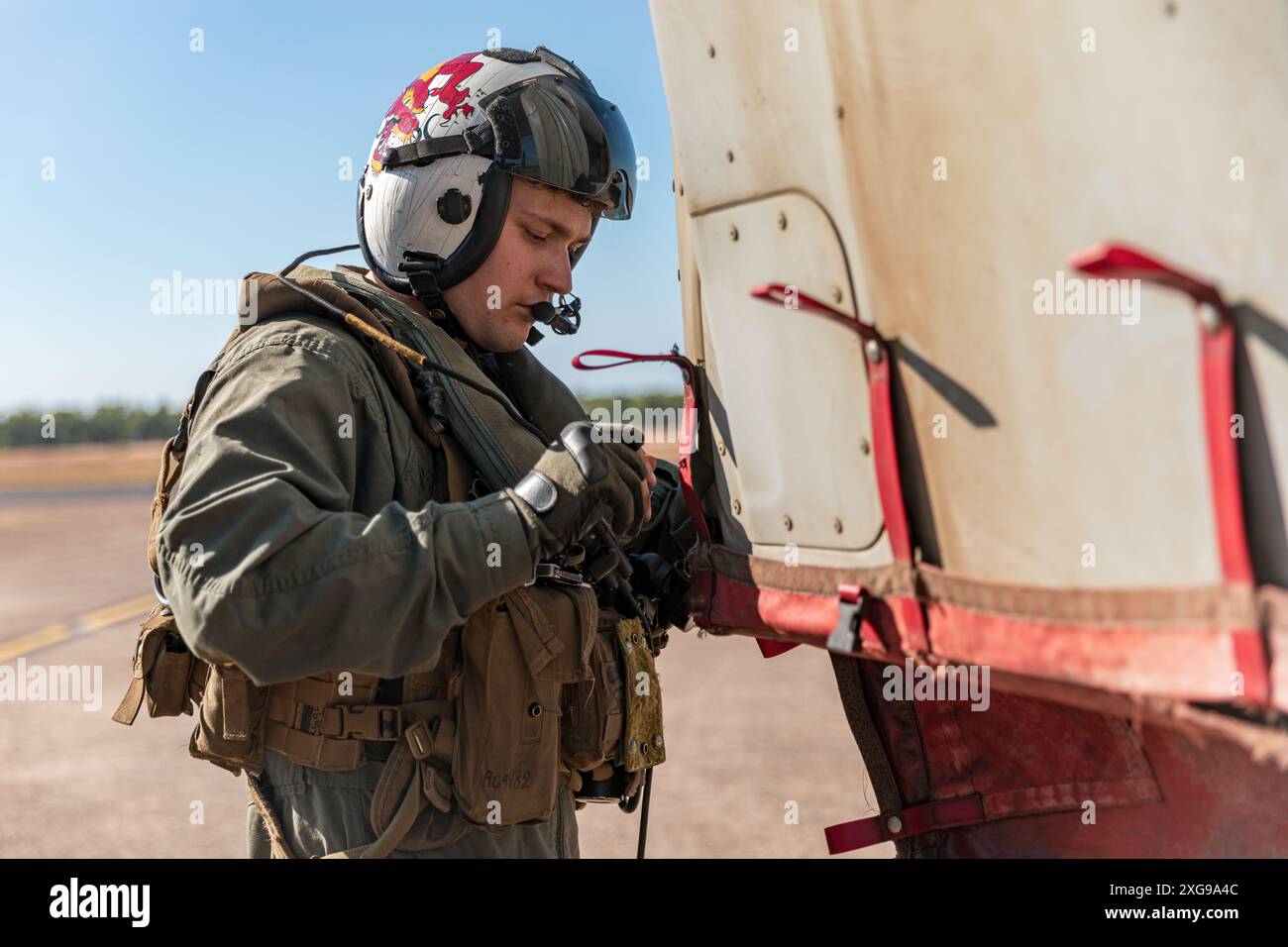 U.S. Marine Corps Sgt. Rodrigo Gutierrez, an MV-22B Osprey crew chief ...