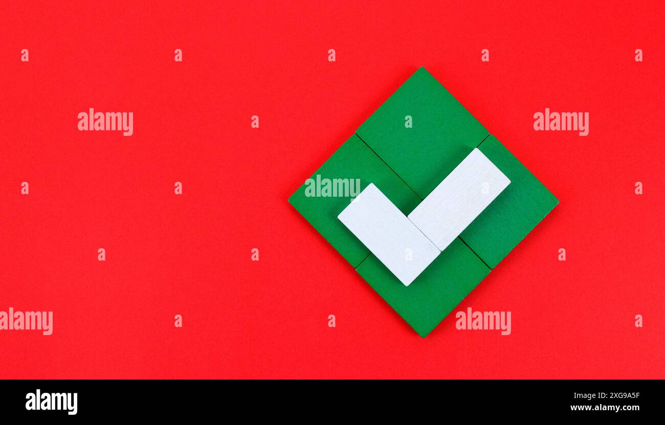 White check mark on green box formed with wooden pieces Stock Photo - Alamy