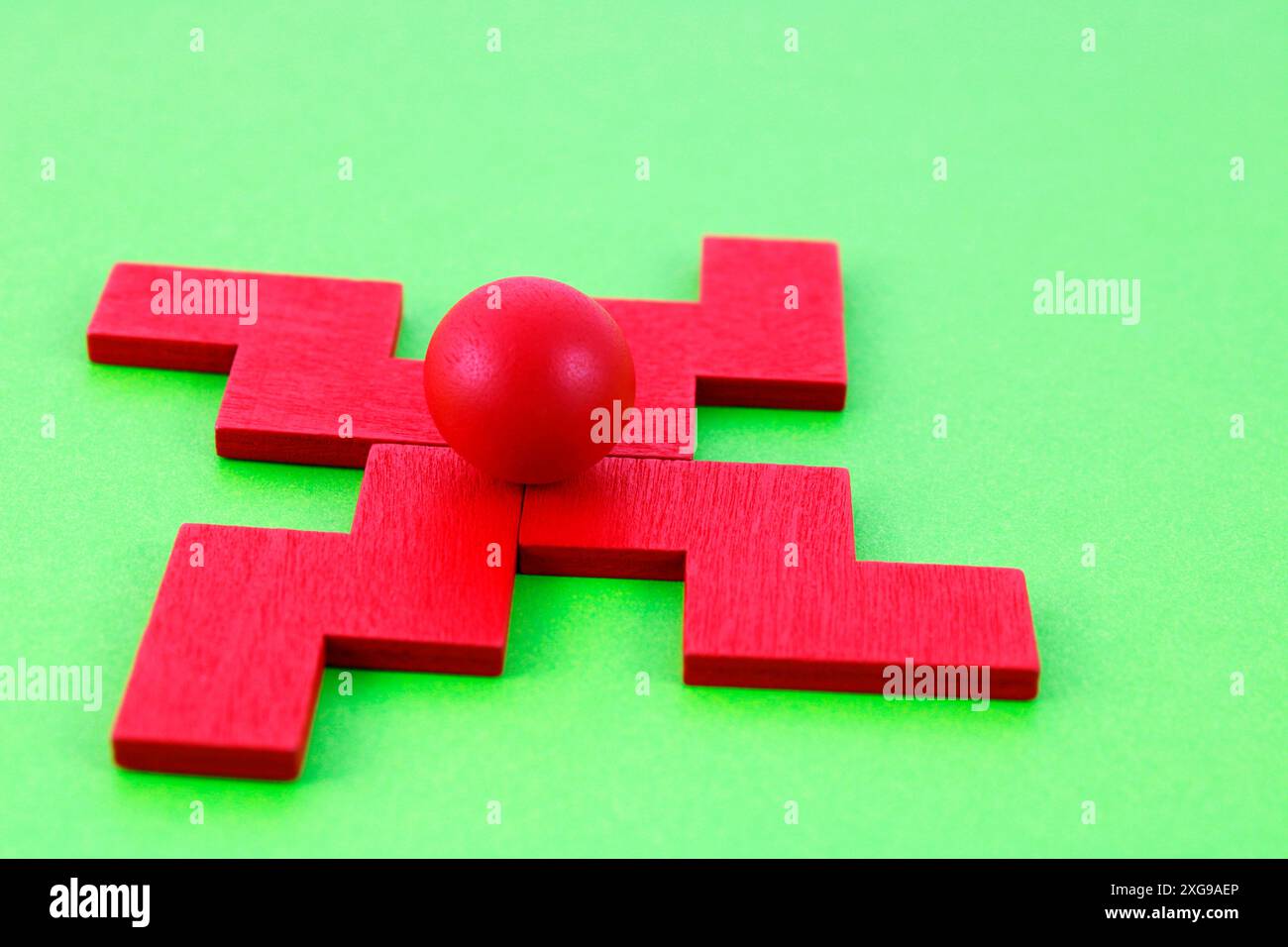 Sphere at the point where four different paths meet Stock Photo - Alamy
