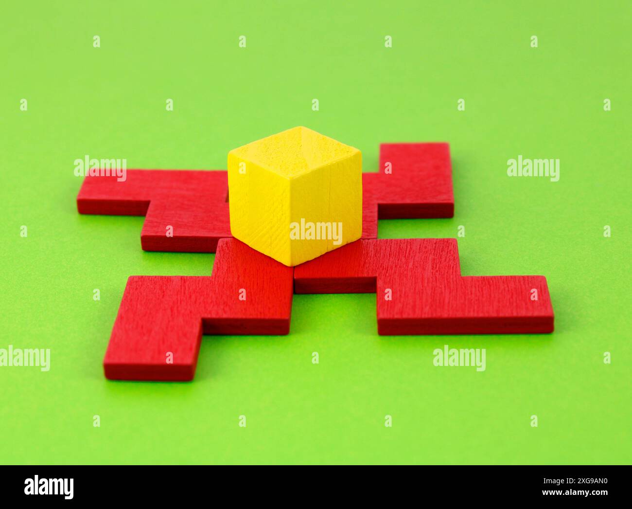 Cube at the point where four different paths meet Stock Photo - Alamy