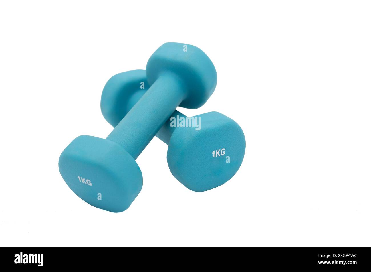Pair of light 1kg dumbbells for warming up exercises. They are blue and ...