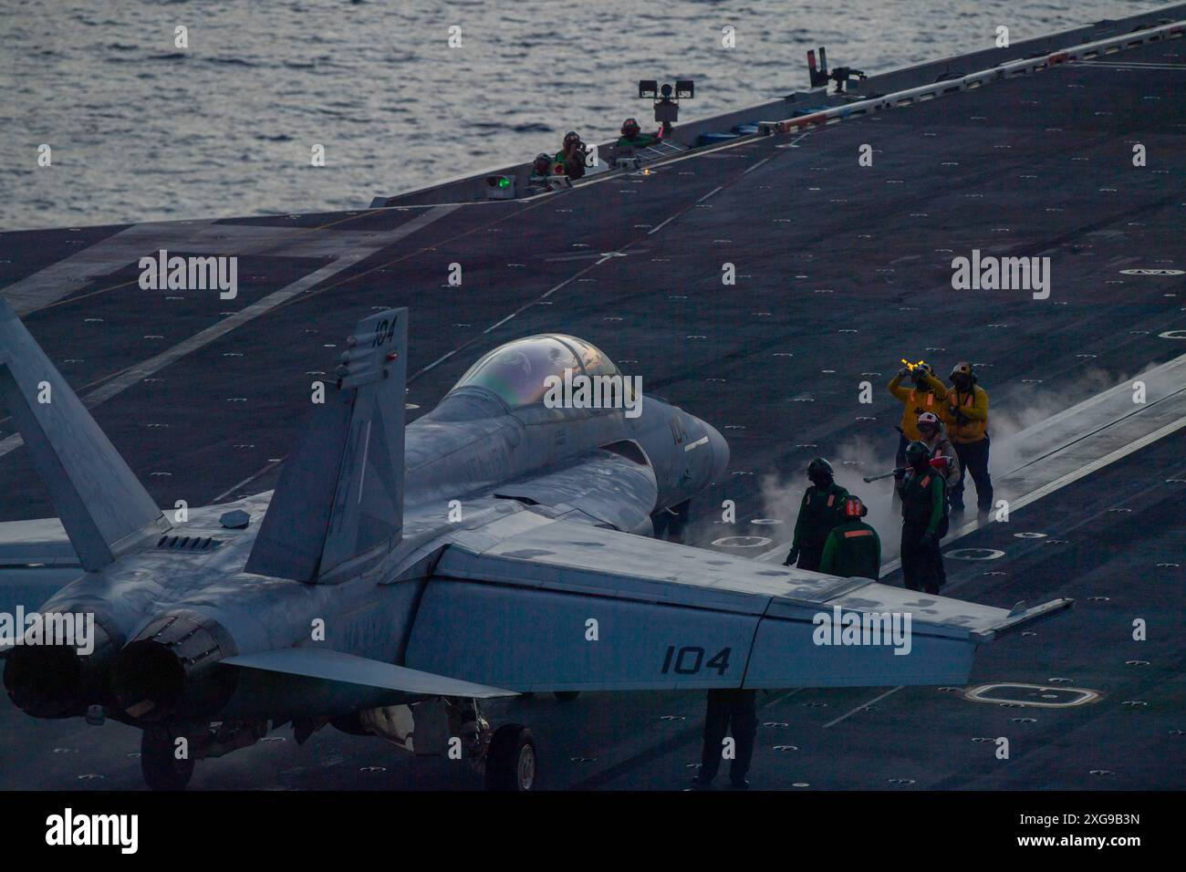 SOUTH CHINA SEA (July 5, 2024) U.S. Sailors prepare an F/A-18F Super ...