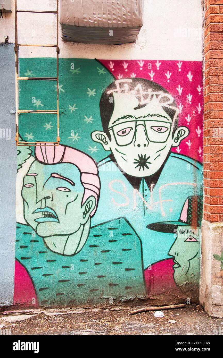 SNF men mural in an alley near Saint-Laurent Boulevard in downtown ...