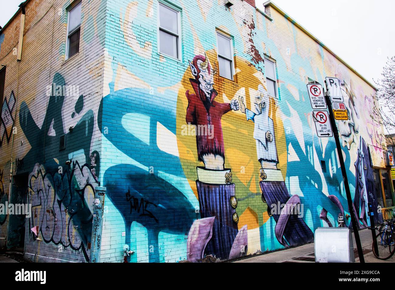 Satan vs. Jesus mural on Saint-Laurent Boulevard in downtown Montreal ...