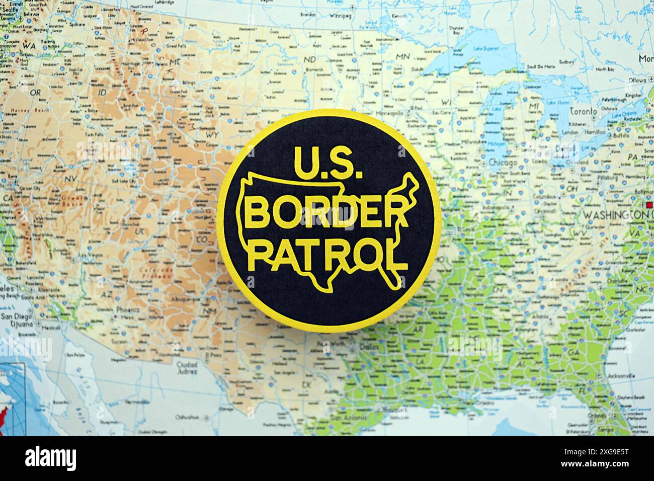 KYIV, UKRAINE - JUNE 26, 2024 U.S. Border Patrol coat of arms on paper ...