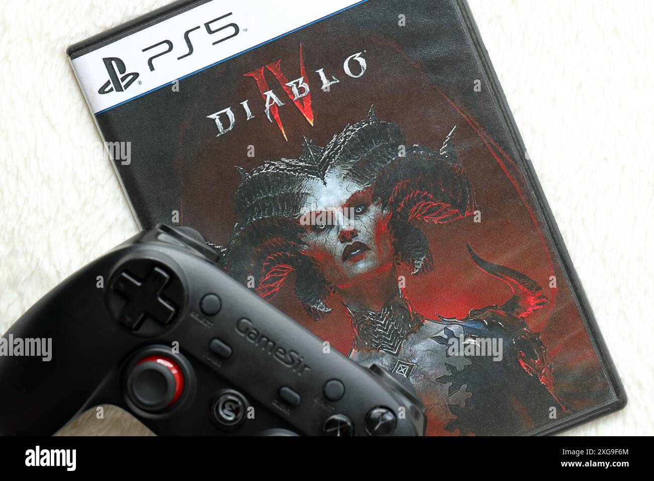KYIV, UKRAINE - JUNE 26, 2024 Diablo 4 PS5 video game disc box for ...
