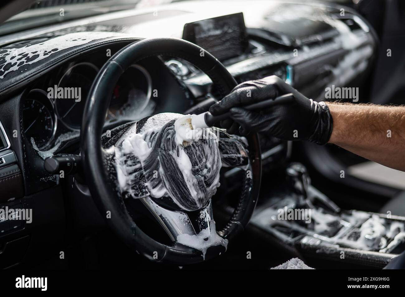 Car mechanic applies layer hi-res stock photography and images - Alamy