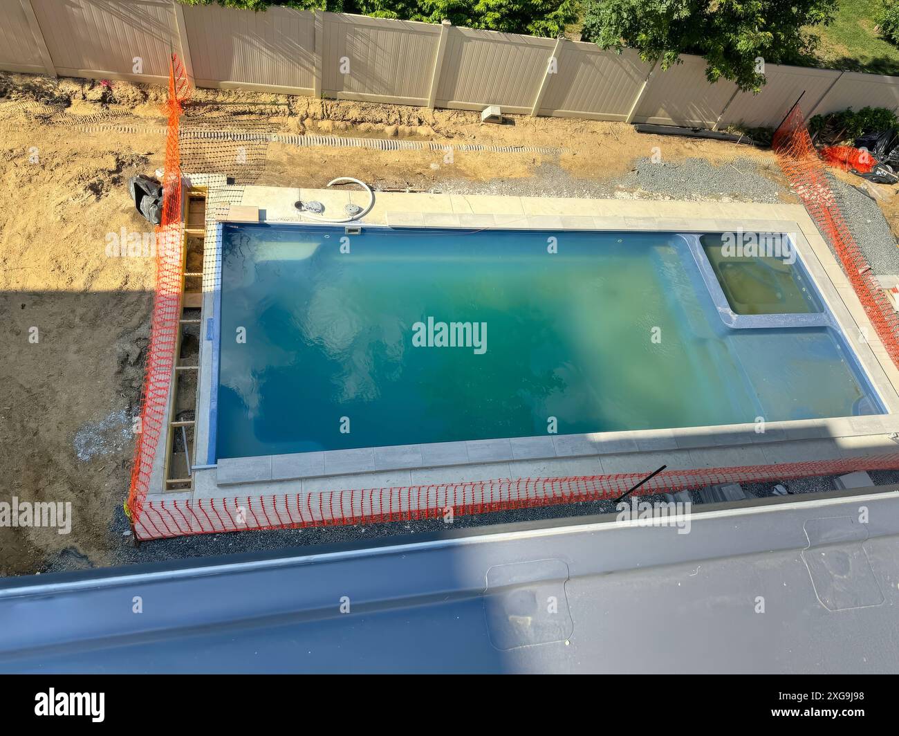 Swimming pool near house is being constructed using structure Stock ...