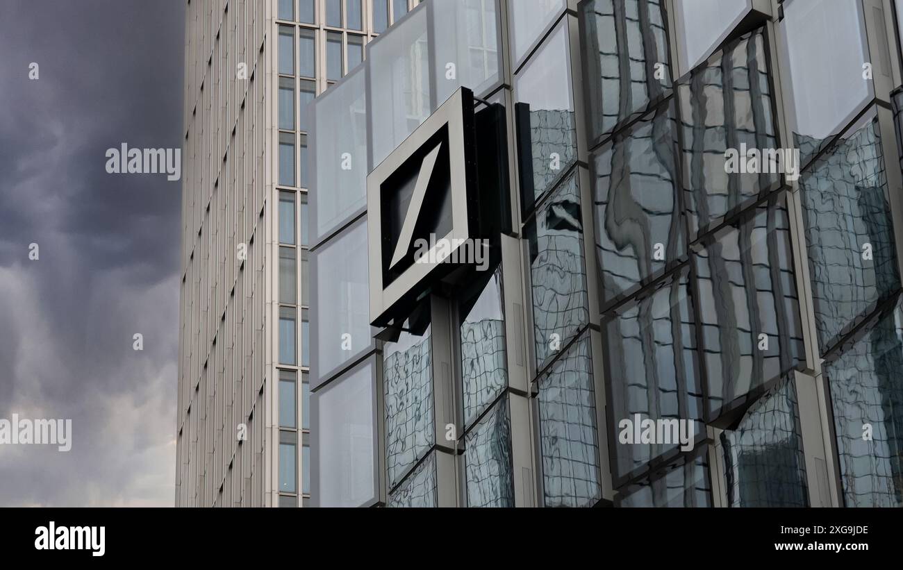 Exterior of Deutsche Bank while Dark clouds passing by. Financial ...