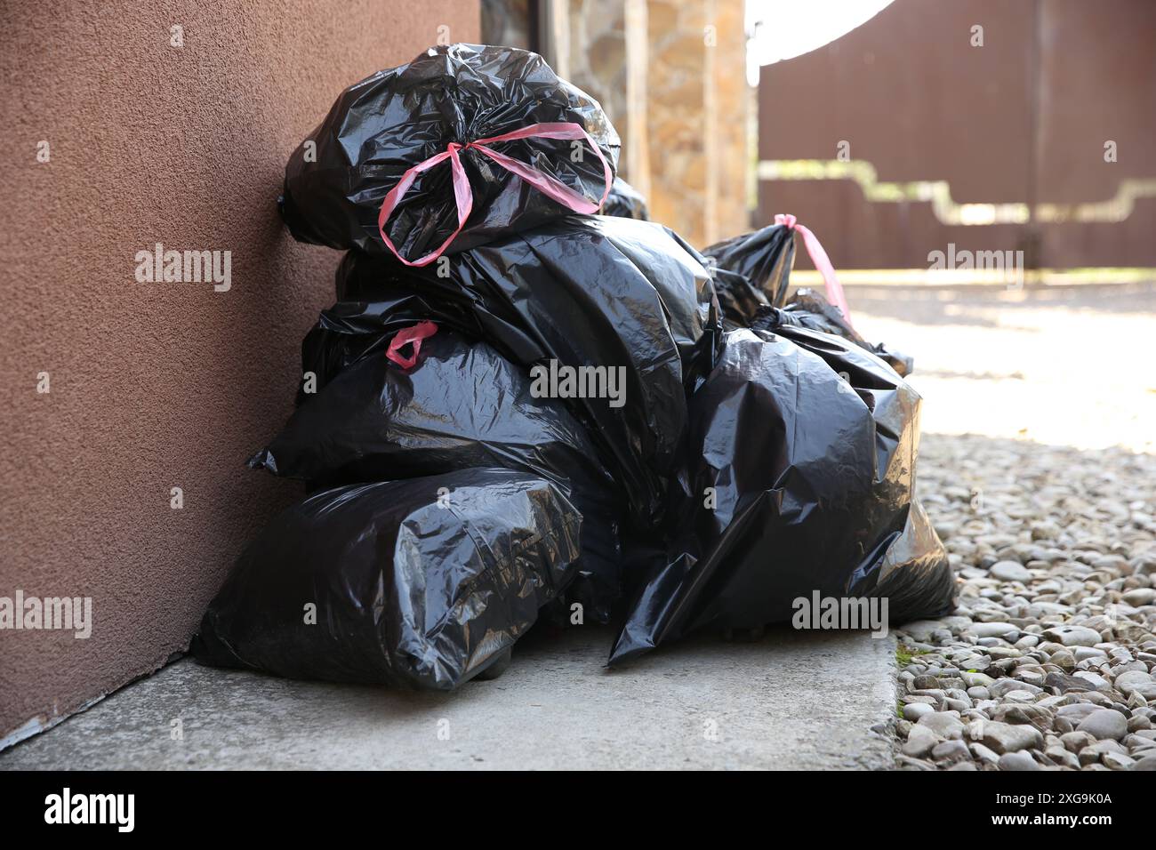Many trash bags hi-res stock photography and images - Alamy