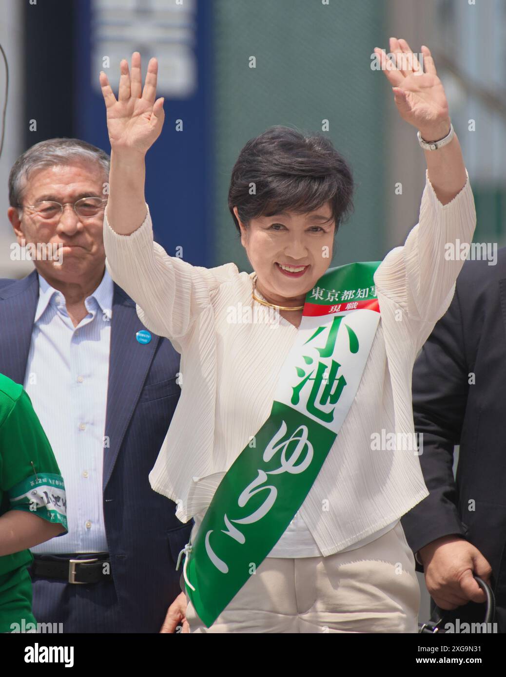 Tokyo Governor Yuriko Koike waves to her supporters during a campaign ...