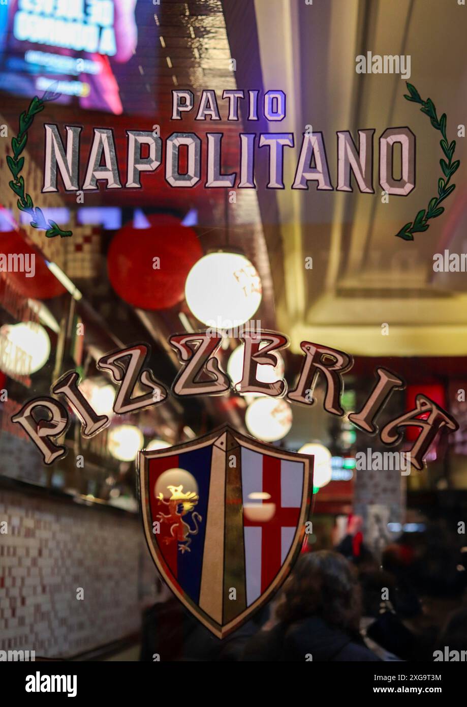 window of the Neapolitan pizzeria Guerrin on Corrientes Avenue at night ...