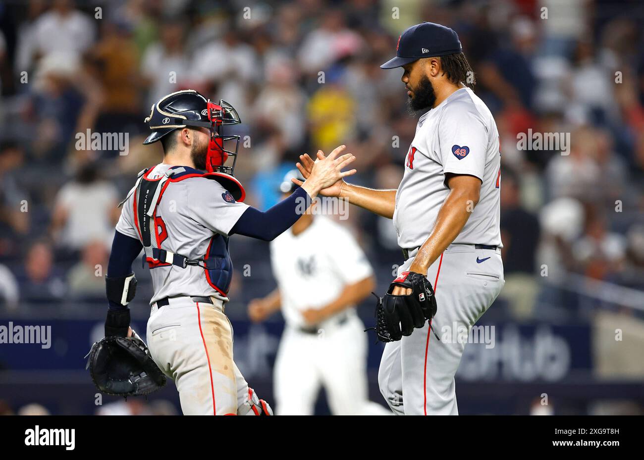 Boston Red Sox's catcher Connor Wong and pitcher Kenley Jansen shake ...