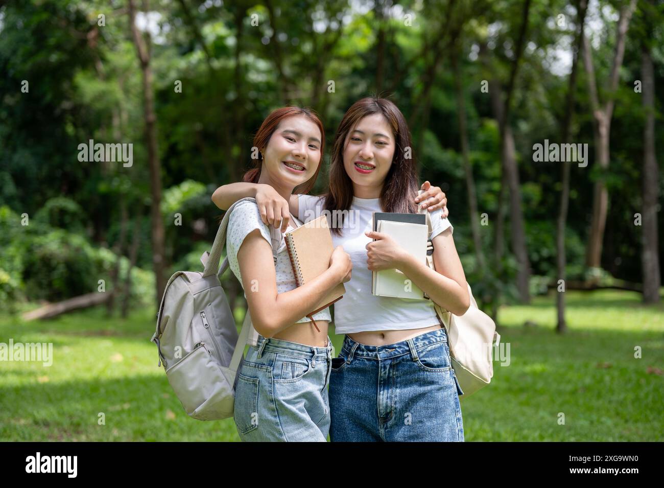 Friends holding others shoulders hi-res stock photography and images ...