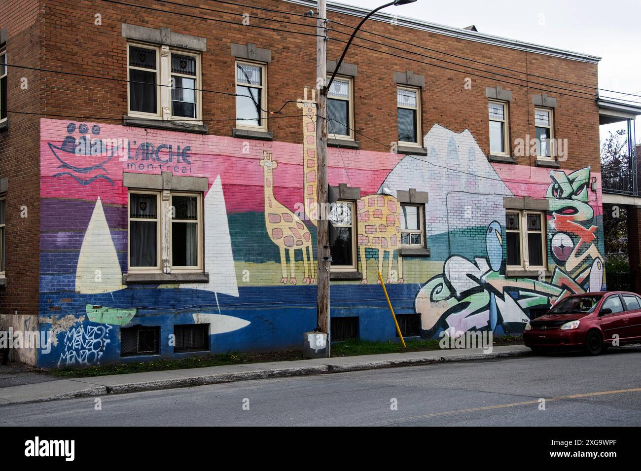 L'Arche giraffe mural on Jolicoeur Street in Montreal, Quebec, Canada ...