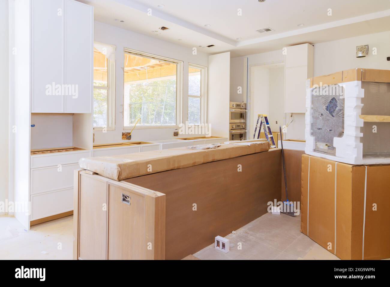 Assembling new kitchen cabinets interior as home improvement Stock ...