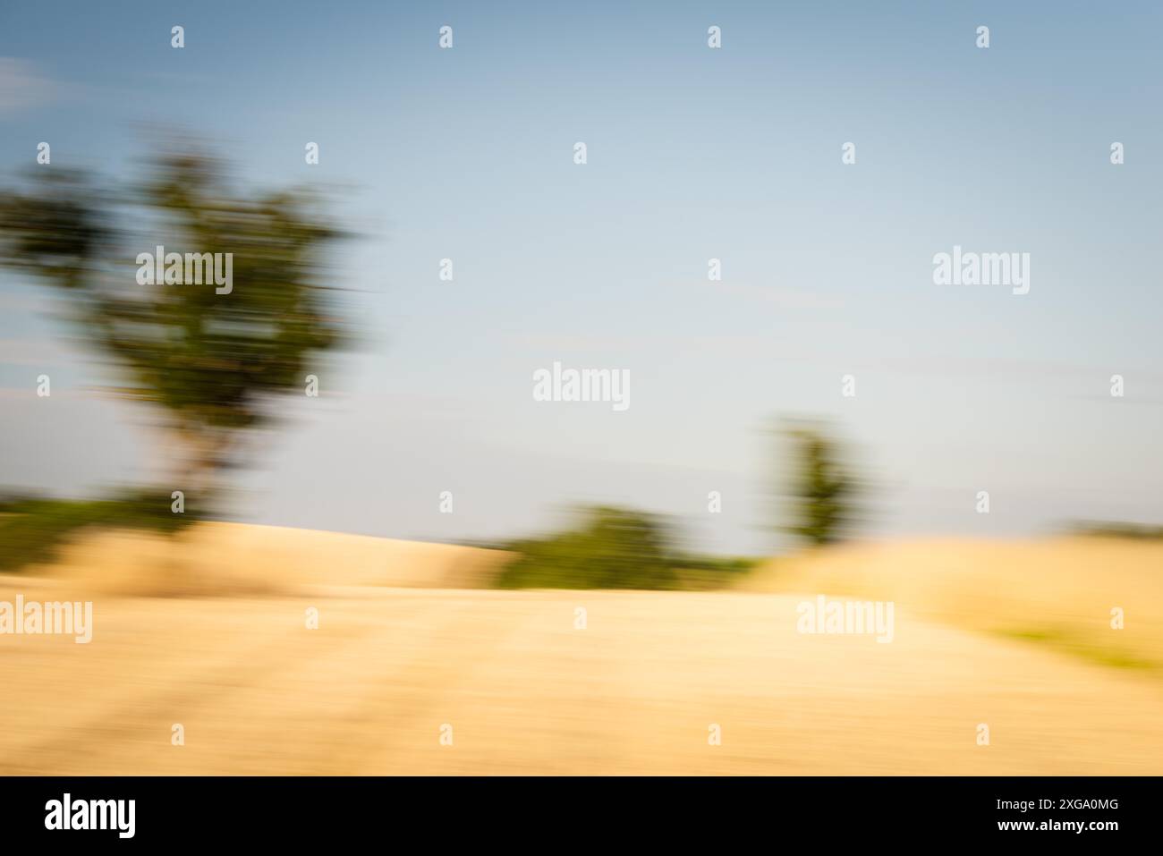 Abstract blurred landscape with tree Stock Photo - Alamy