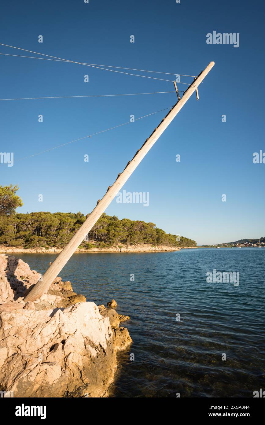 Beach ladder for fishing in croatia Stock Photo - Alamy