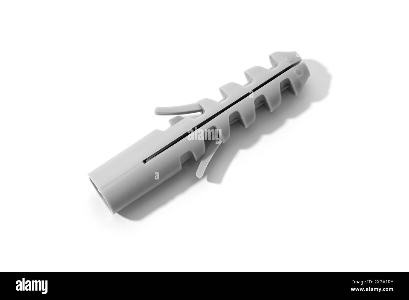 Plastic dowel isolated on a white background. Wall anchor Stock Photo ...