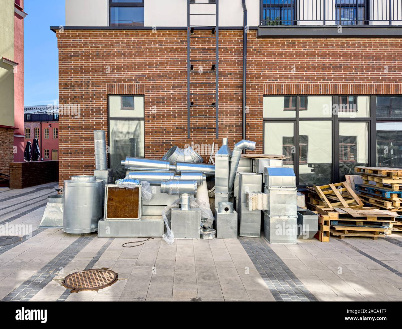 old building renovation and upgrading. air pipes and fittings, parts of ...