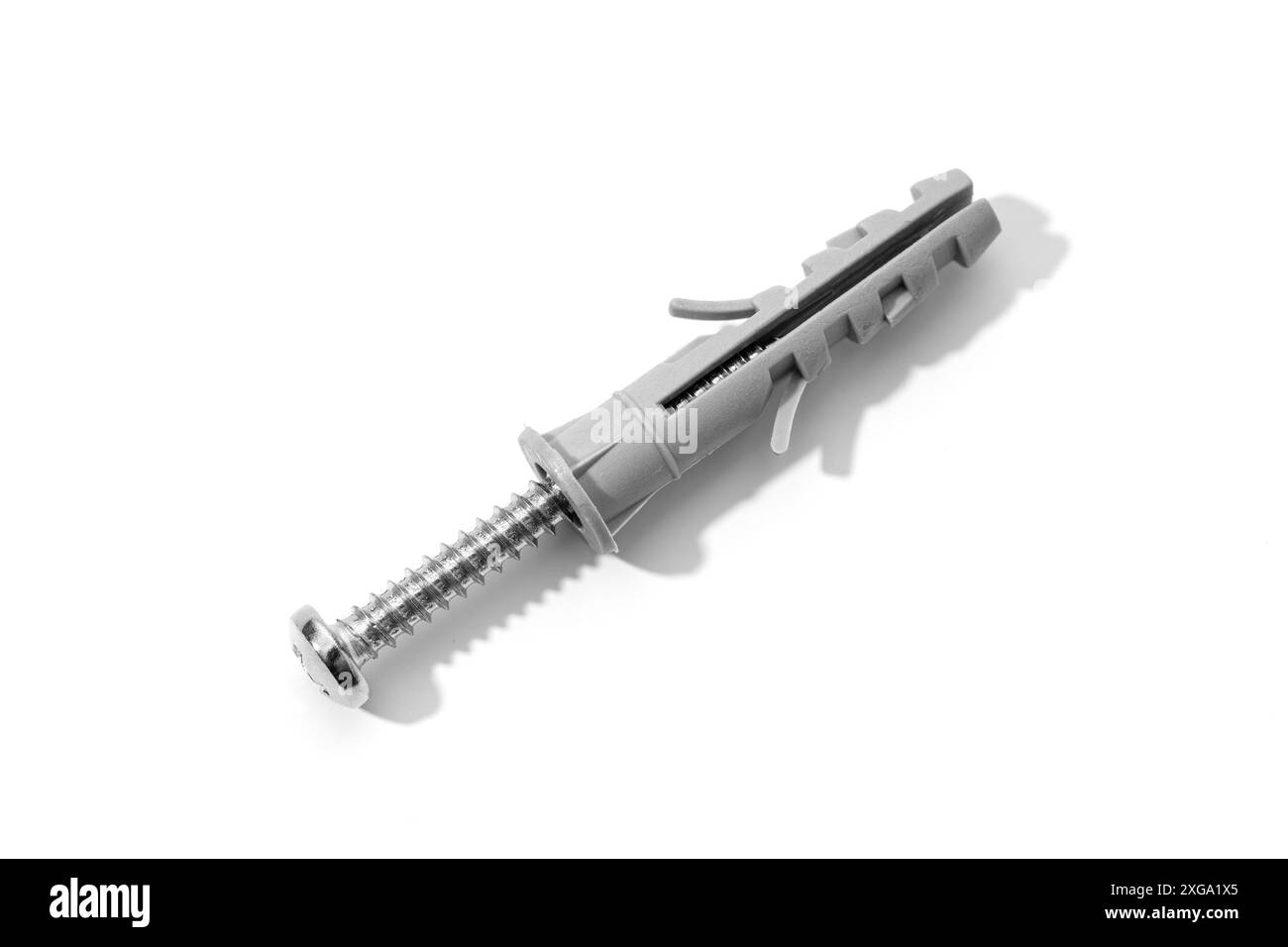 Plastic dowel and screw isolated on a white background. Expansion ...