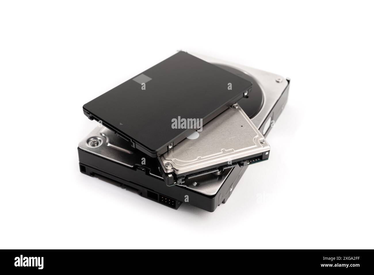 Pile of a variety of computer Hard disk drive HDD and SSD isolated on ...