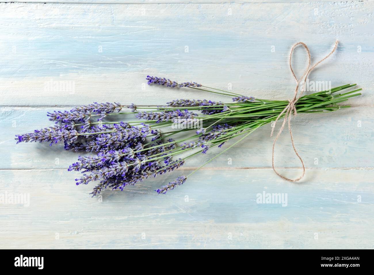 Lavender (lavandula) bouquet on a rustic wooden background, a bunch of ...