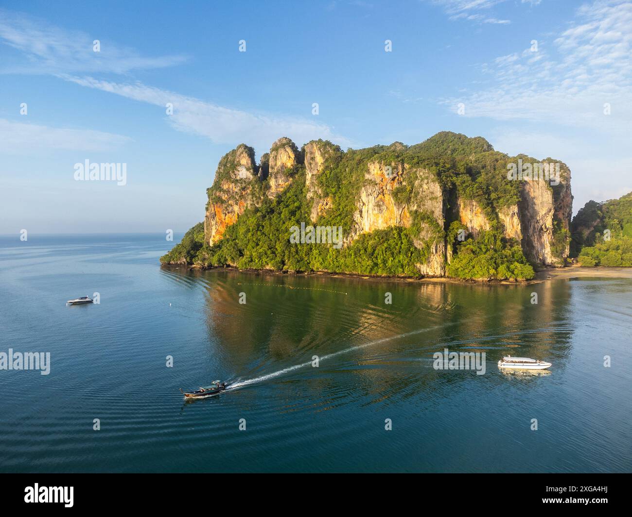 Railay, Thailand: Dramatic aerial view of a traditional longtail boat ...