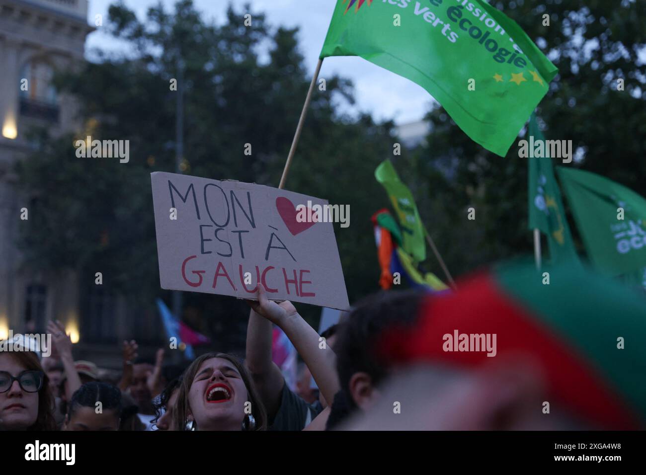 A demonstrator holding a placard with the message my heart is on the ...