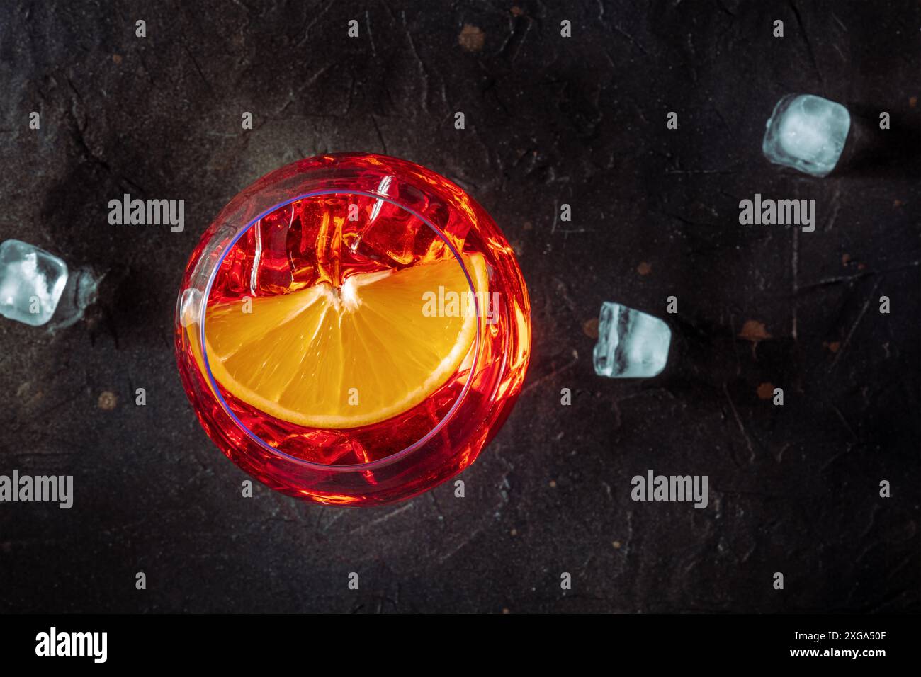 Aperol cocktail with an orange slice and ice cubes close-up, Italian ...
