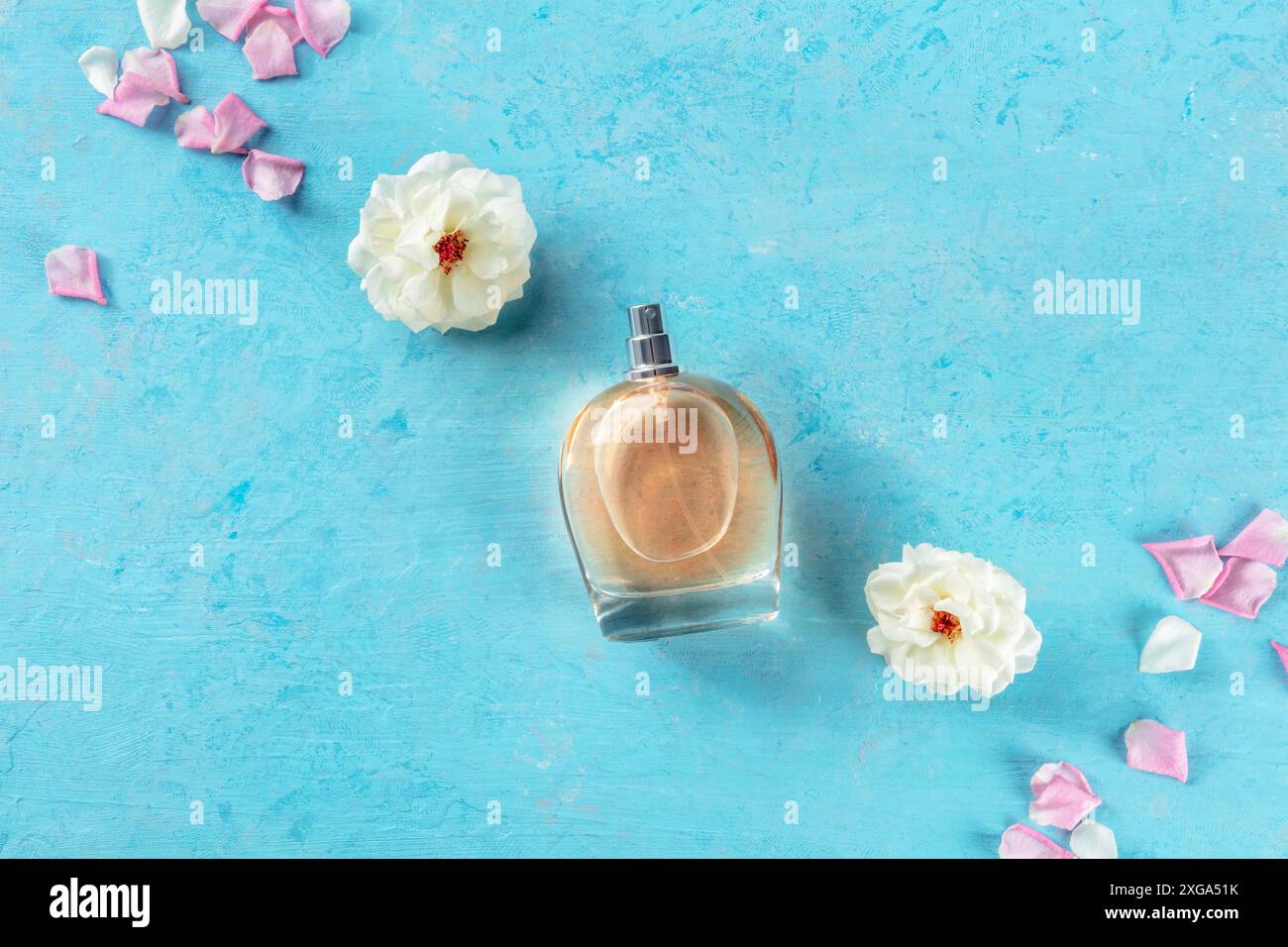 Perfume bottle and flower rose hi-res stock photography and images - Alamy