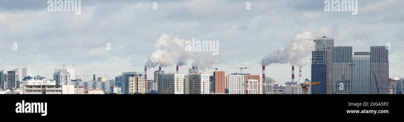Cityscape with smoking plant chimneys, urban landscape, large city ...