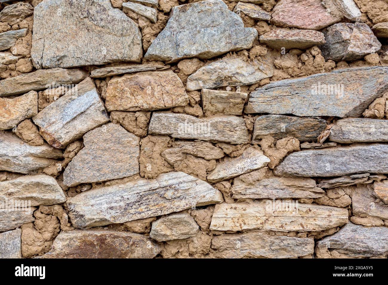 Grunge background of vintage gray and yellow stone brick wall texture ...